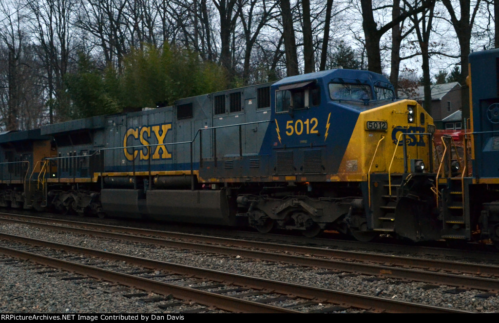CSX AC60CW 5012 trails on Q410-13